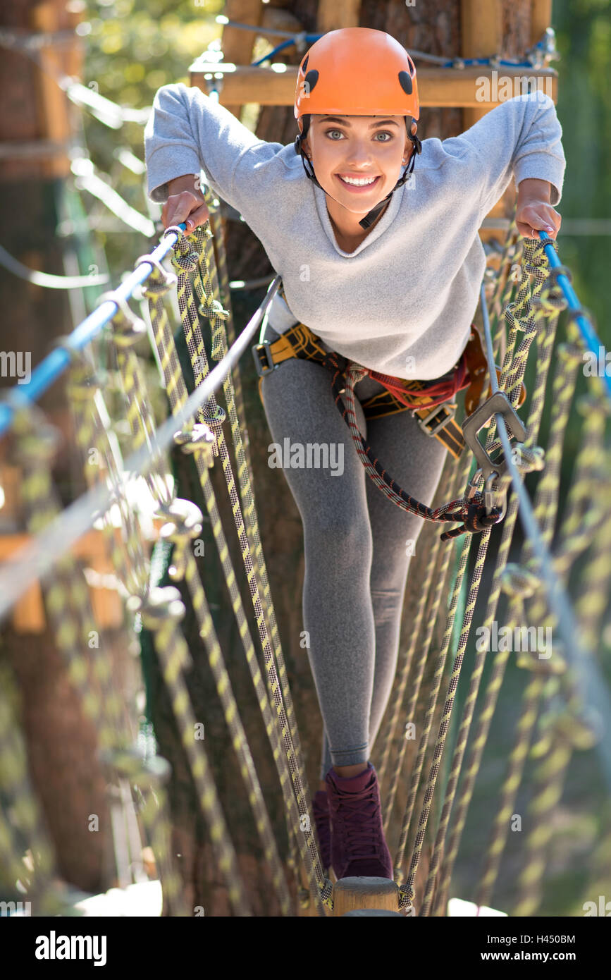 Brave confident woman walking on a narrow path Stock Photo - Alamy