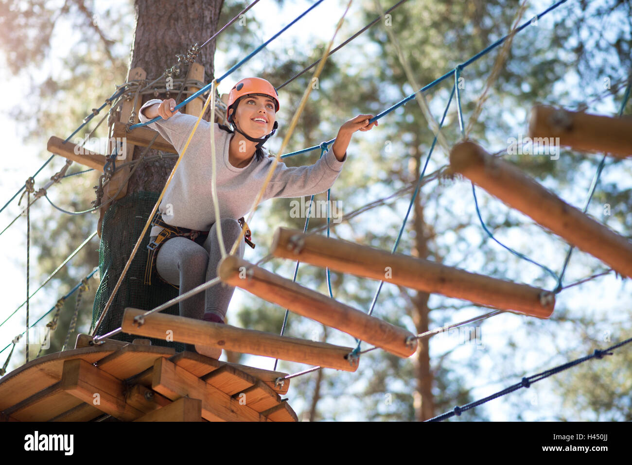 Woman up a ladder outside hi-res stock photography and images - Alamy