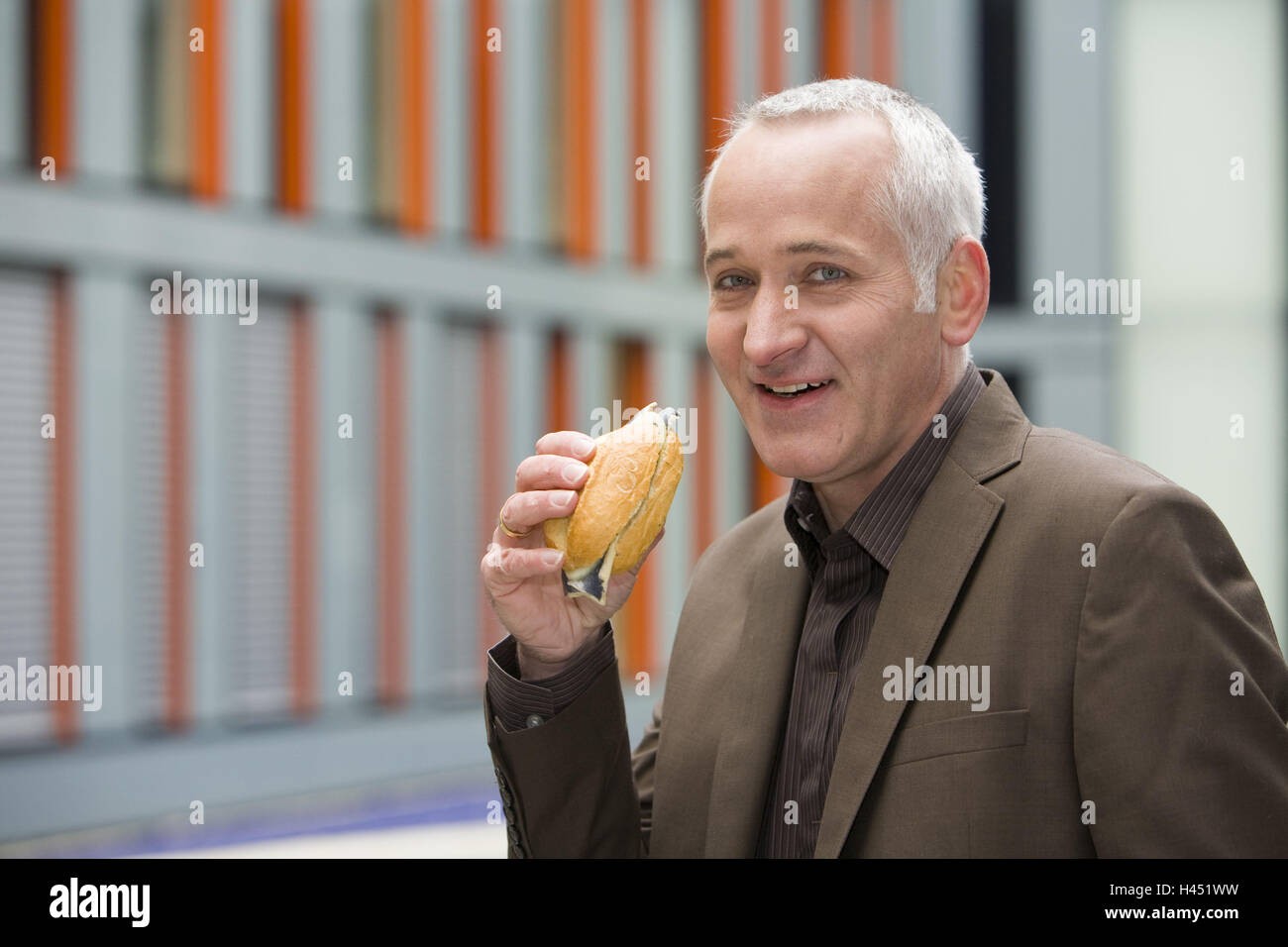 Lunch break, midday food, businessman Stock Photo - Alamy