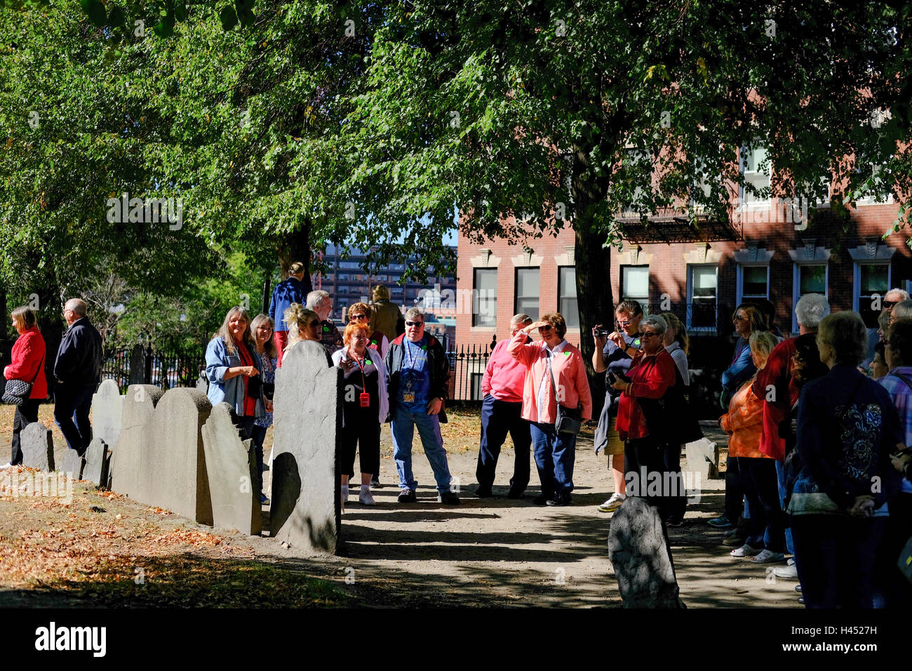 Group of tourists seen with there guide on an historic walk in a Boston ...