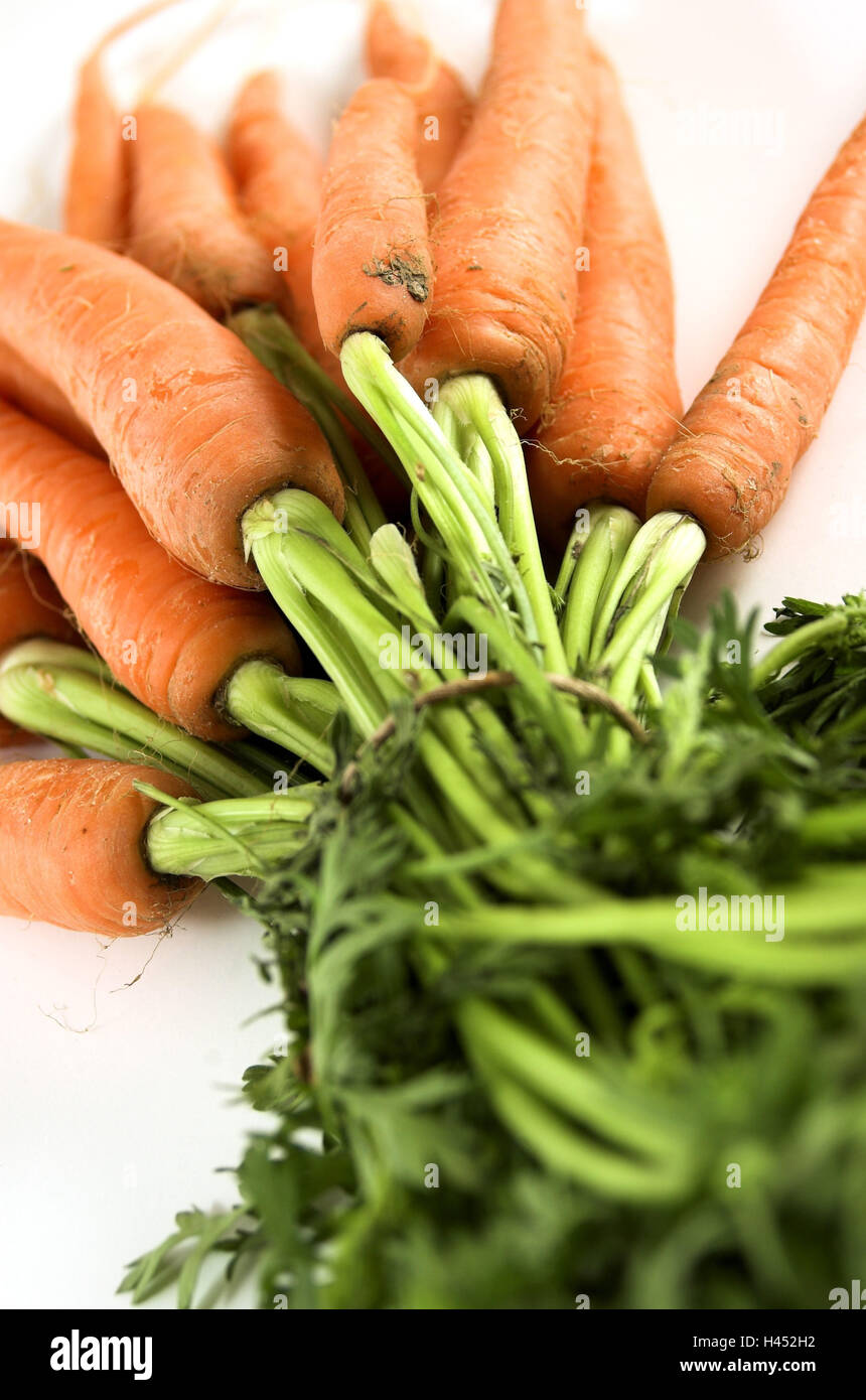Carrot bundle, detail, blur Stock Photo - Alamy