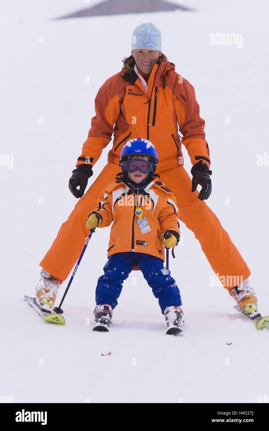 Mother, child, skiing, snow plow, winter Stock Photo - Alamy