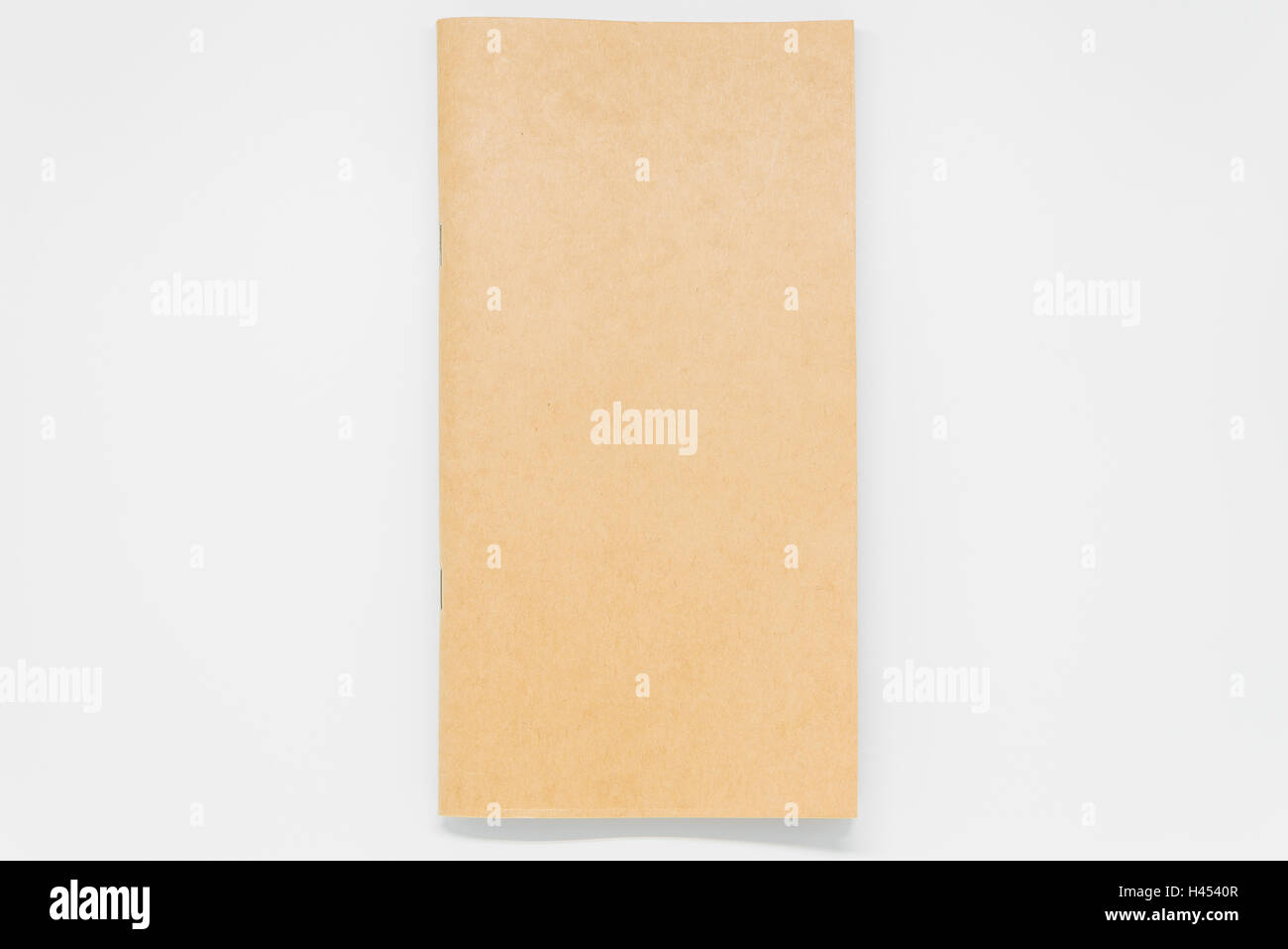 Brown plain notebook on white background and selective focus Stock ...