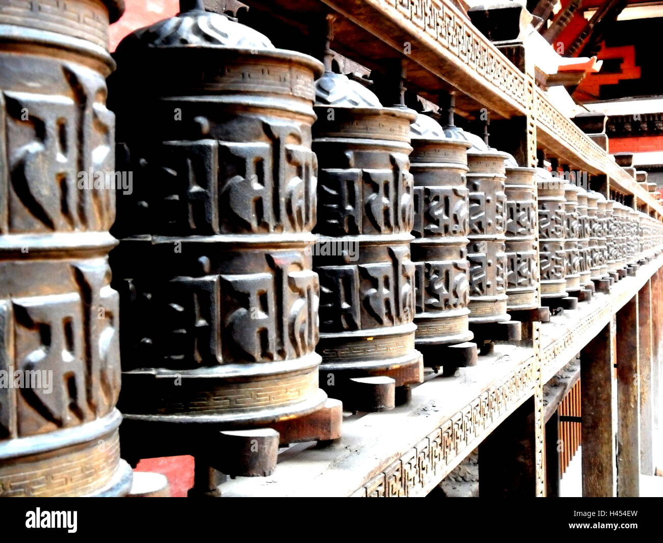row of prayer bells in a buddhist temple, in kathmandu nepal Stock ...