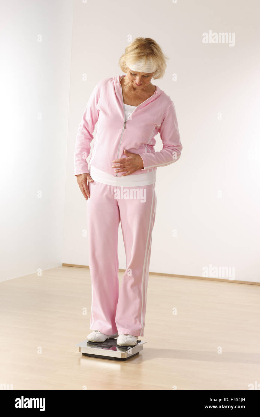 Senior, sport, fitness, scales, stand, doubtful Stock Photo - Alamy