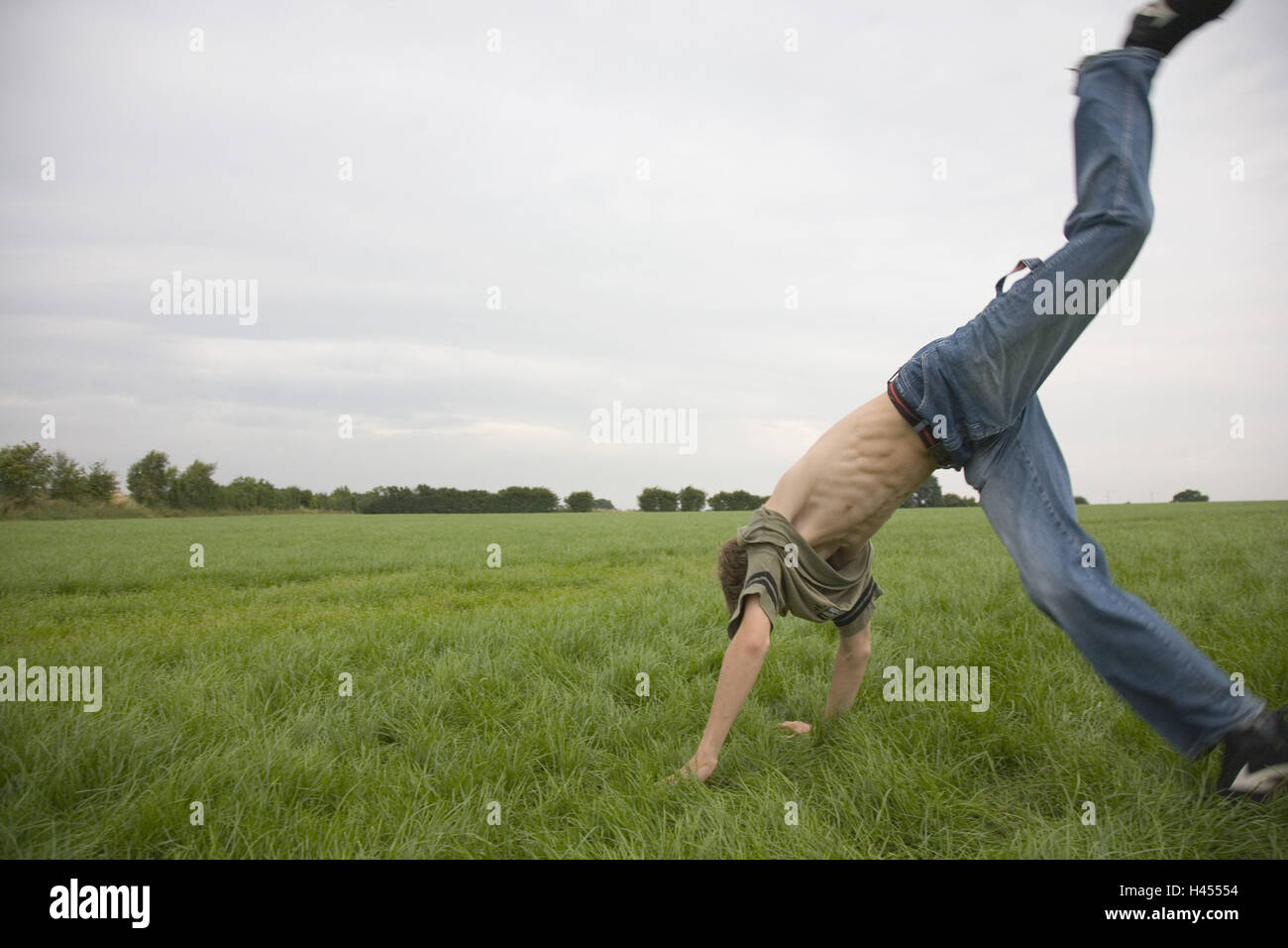Boy, teenager, meadow, hand state Stock Photo - Alamy