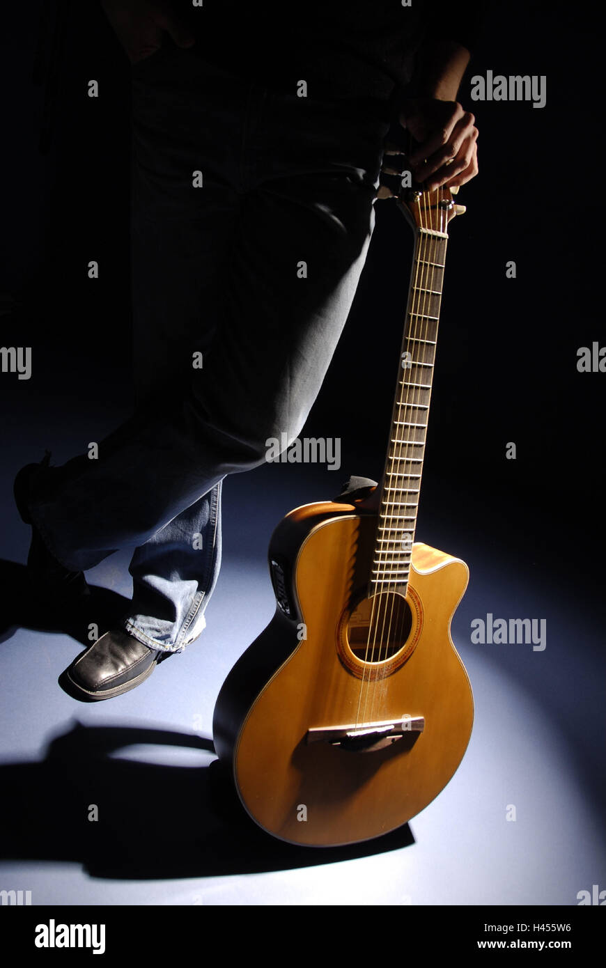 Guitar, musician, standing, detail Stock Photo - Alamy