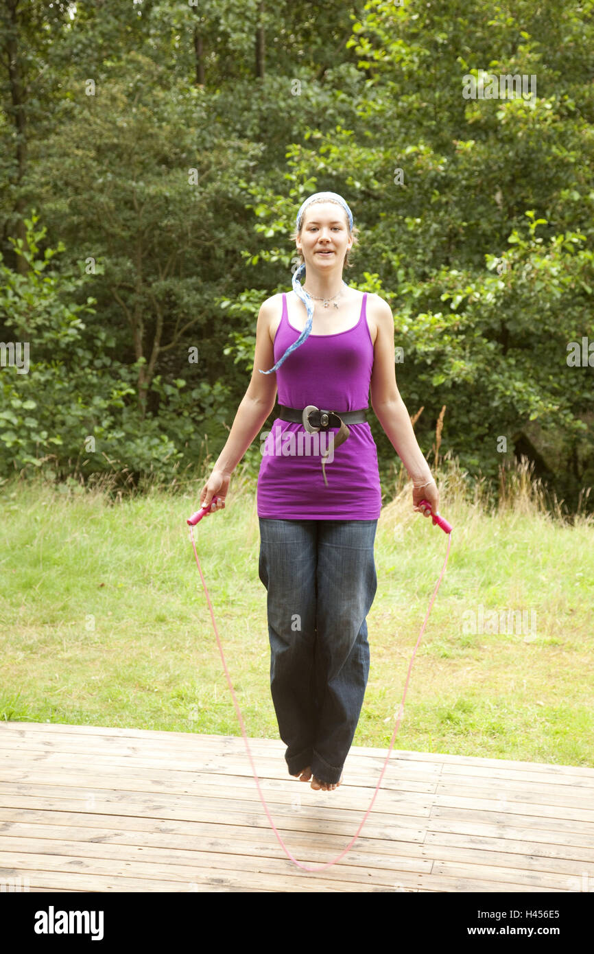 Girls, jumping rope, terrace Stock Photo - Alamy