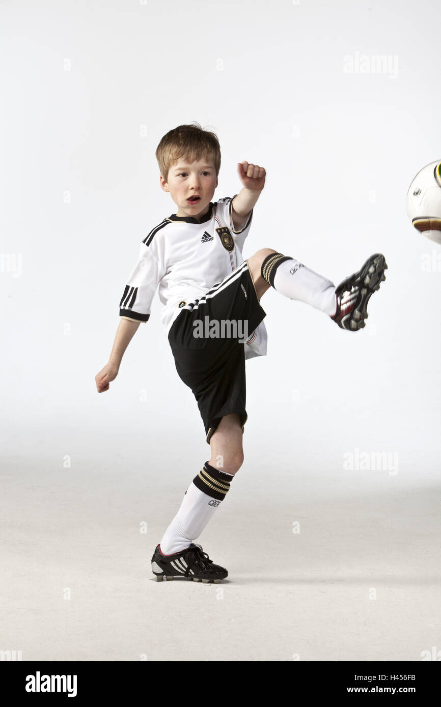 Football in motion hi-res stock photography and images - Alamy