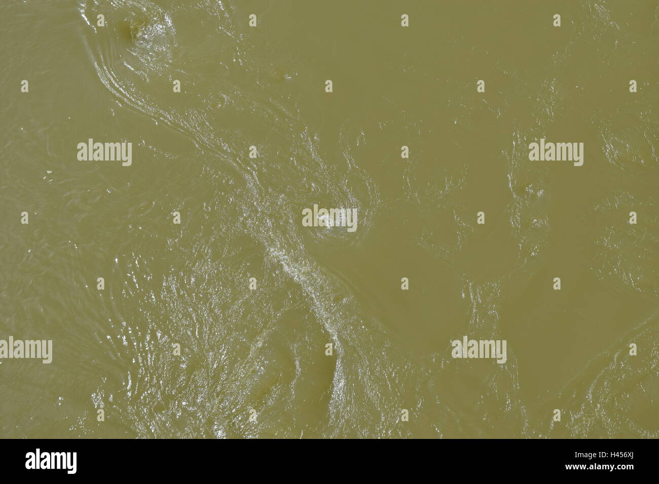 natural alluvial water flowing with straw colored background Stock ...