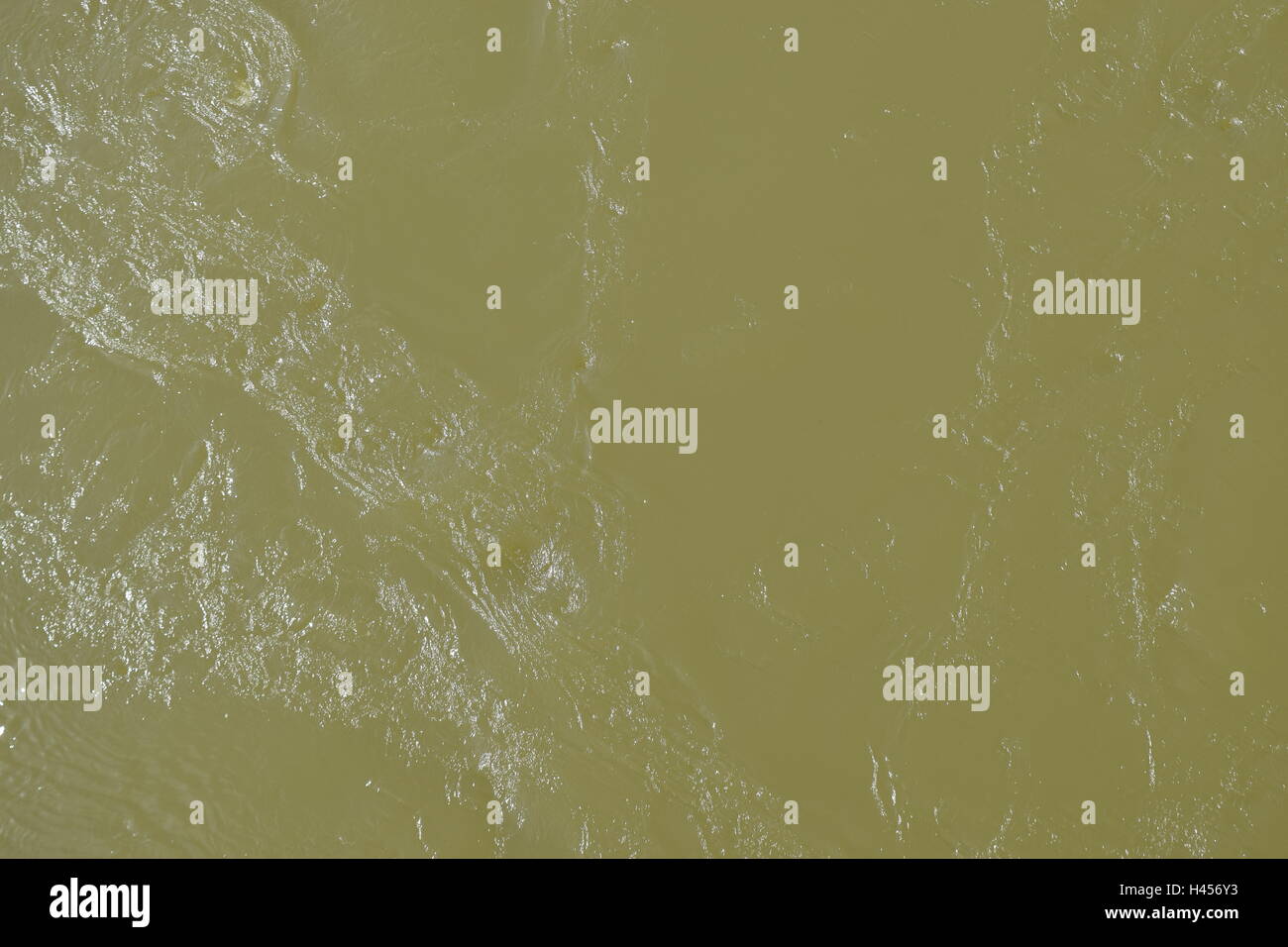 natural alluvial water flowing with straw colored background Stock ...