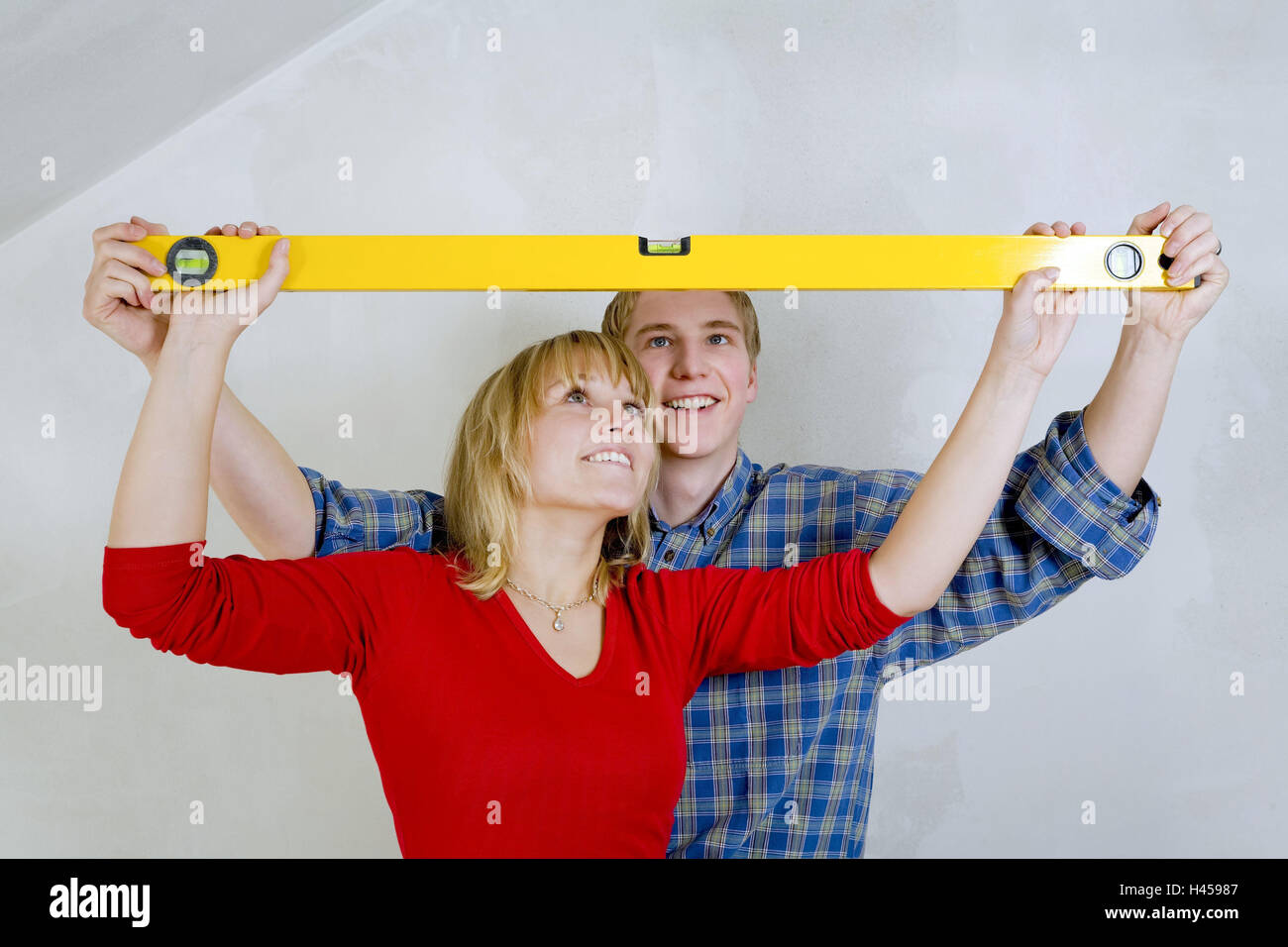 Couple, young, level, together, hold, icon, do it yourself, teamwork ...