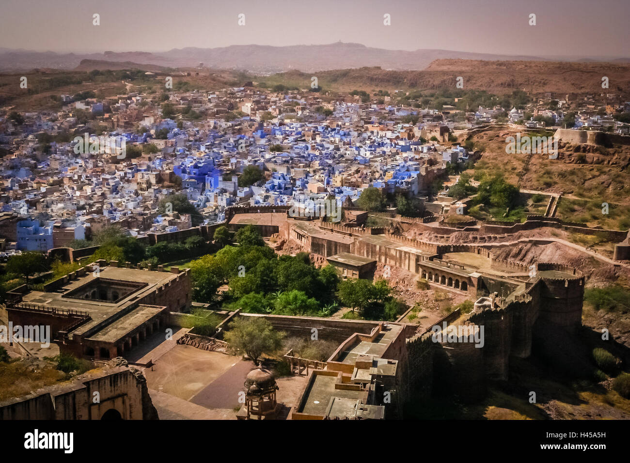 Walls of Jodhpur fort with the Blue City below, India Stock Photo - Alamy