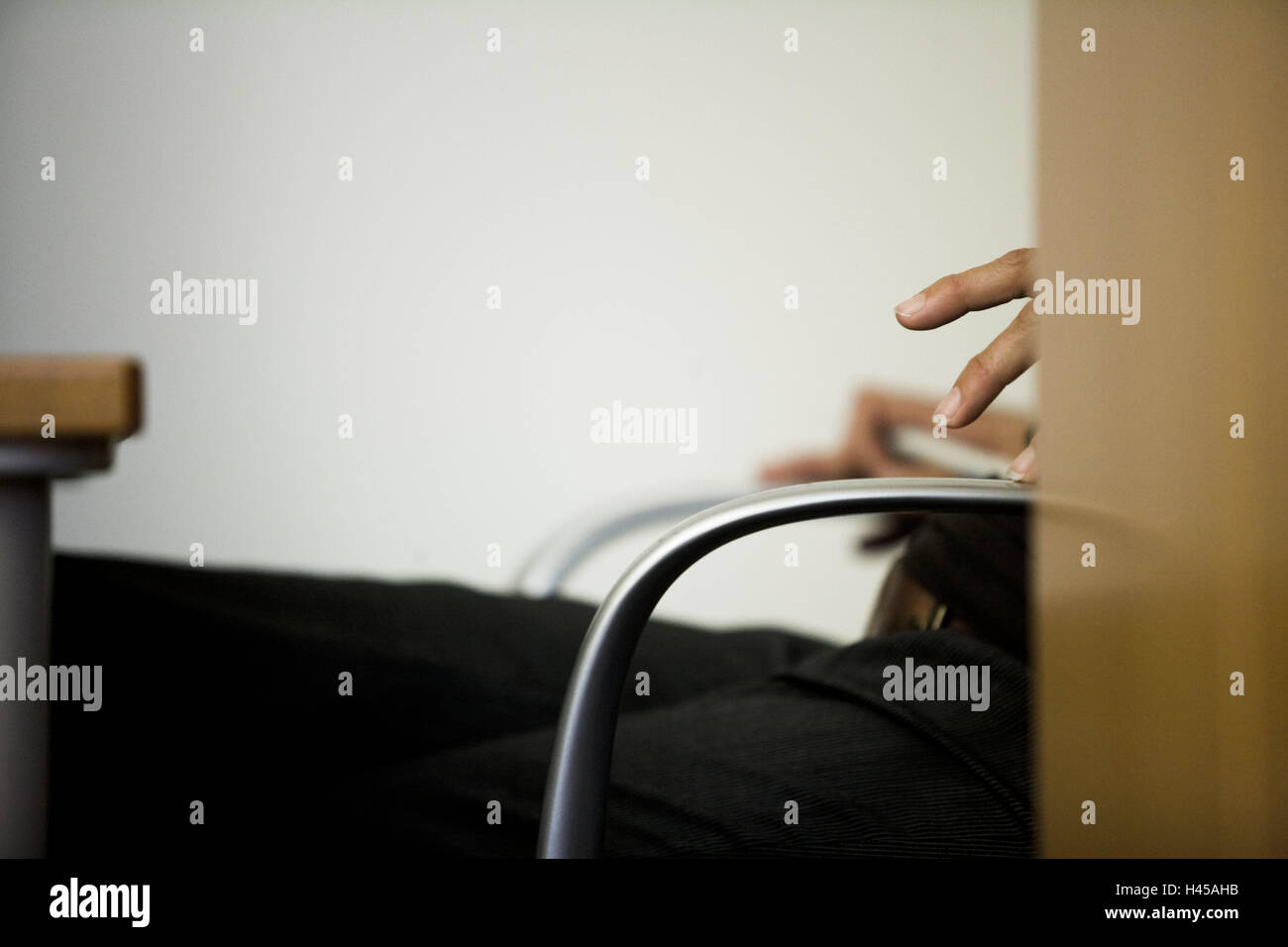 Sit, woman, chair, armrest, fingertips, touch Stock Photo - Alamy