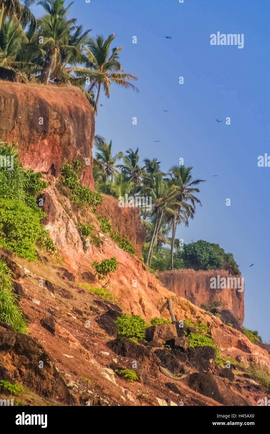 Stunning red cliffs at the beautiful Varkala seaside, India Stock Photo ...