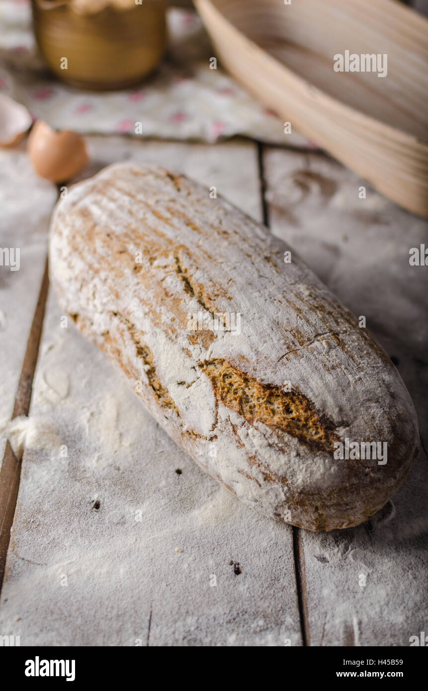 Homemade rustic bread, baked in oven, wheat leaven, breaded in a basket ...