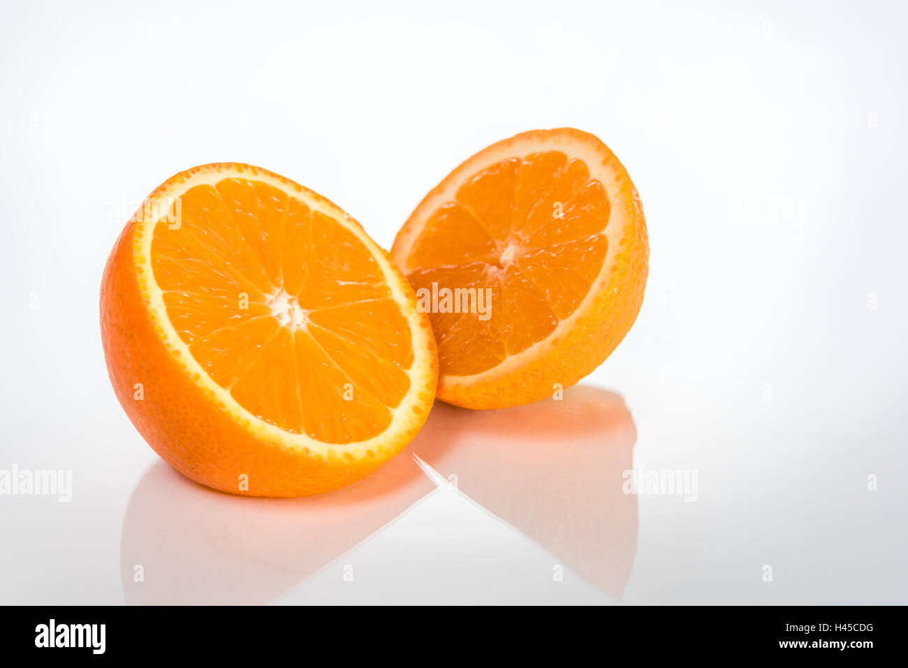 Cut orange hi-res stock photography and images - Alamy