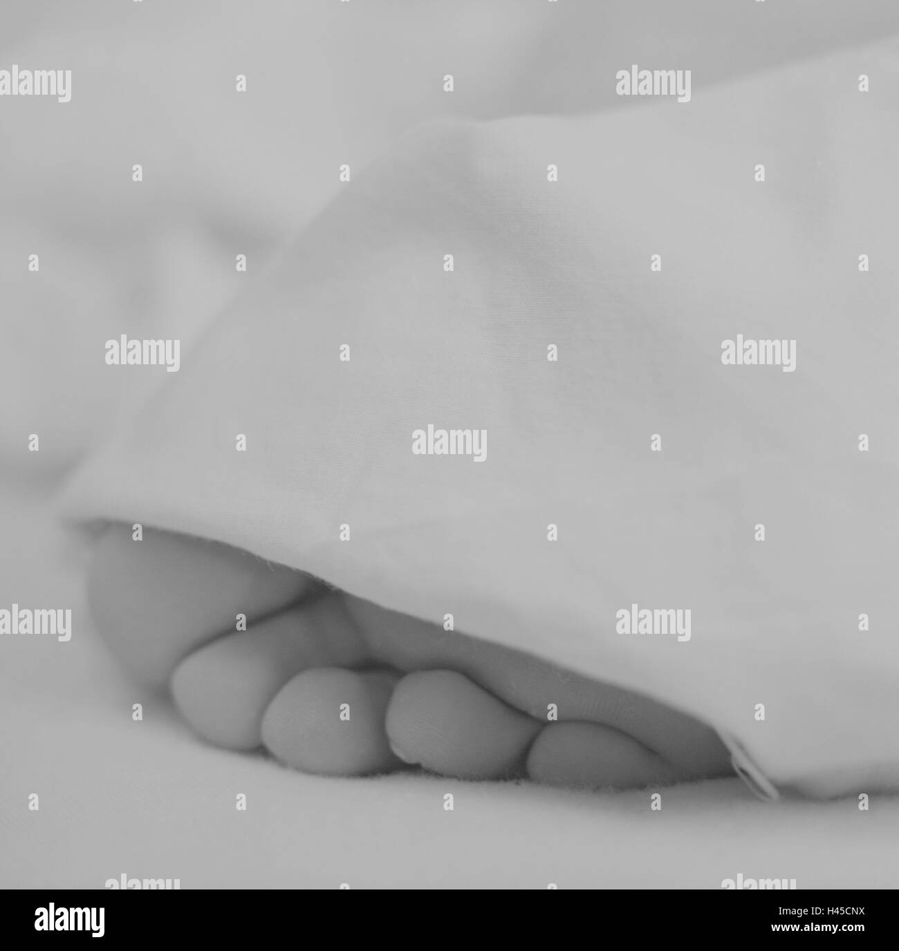 To toes under of a blanket, detail, b/w, model released Stock Photo - Alamy