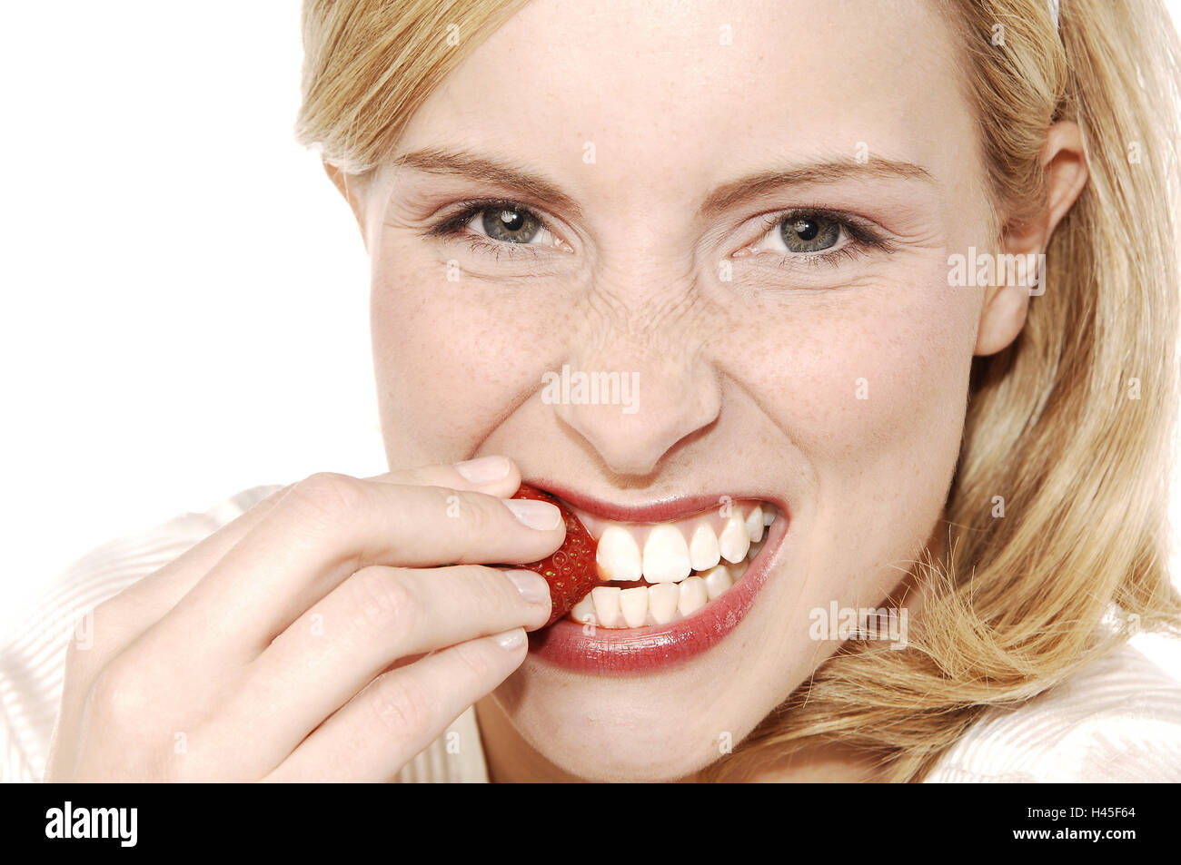 Woman, young, blond, strawberry, eat, portrait, curled Stock Photo - Alamy