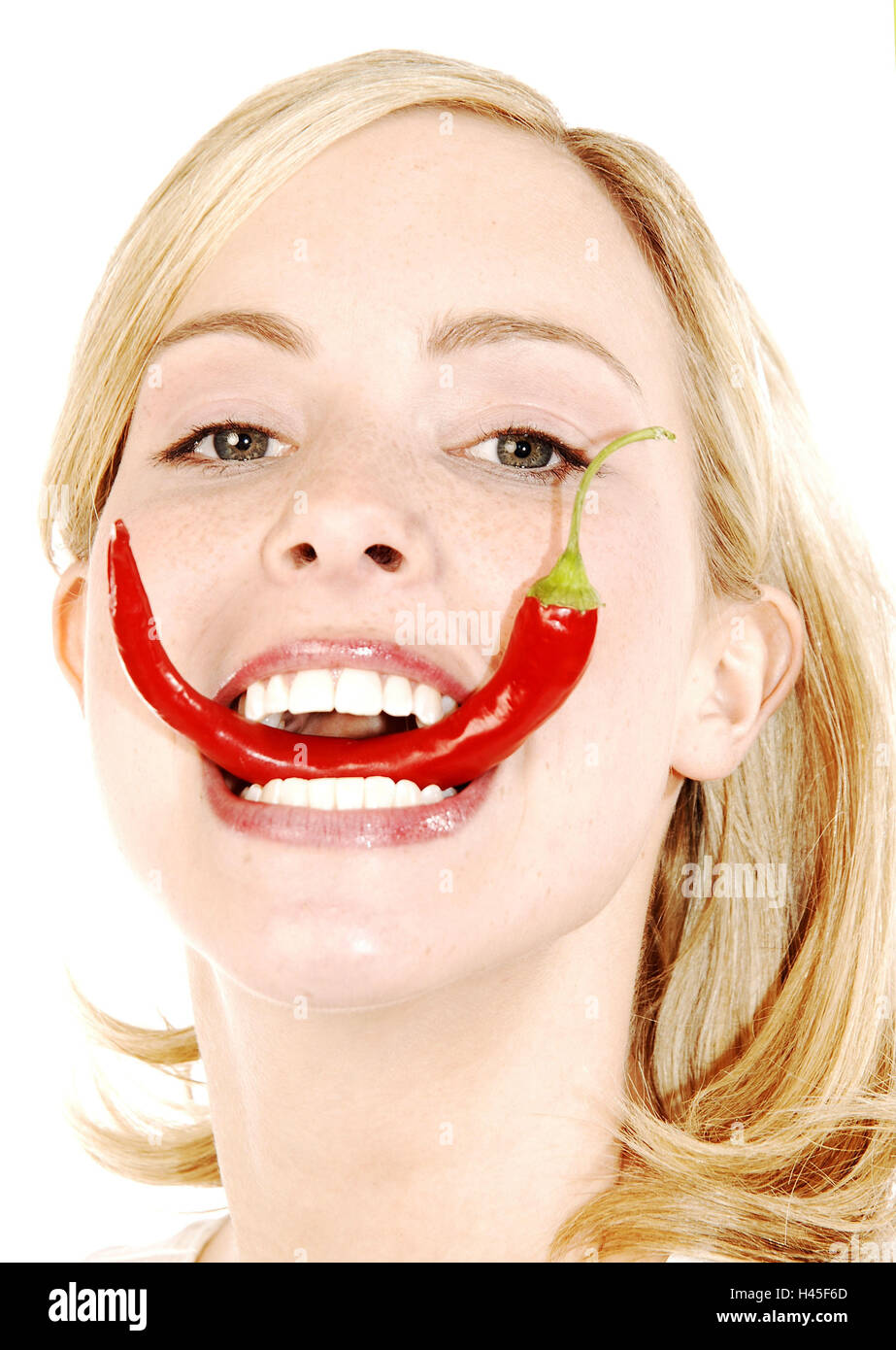 Woman, smile young, blond, mouth, chilli, portrait Stock Photo - Alamy