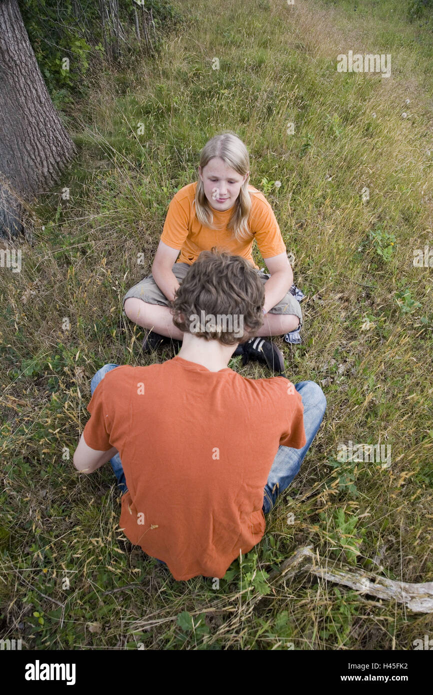 Boys, teenagers, two, meadow, sit, towards Stock Photo - Alamy