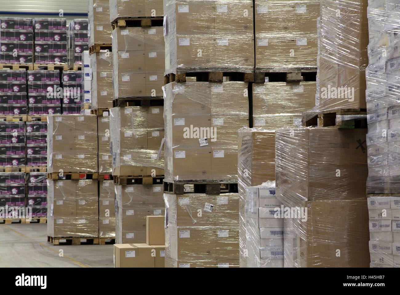 Warehouse, packages, stacked Stock Photo - Alamy