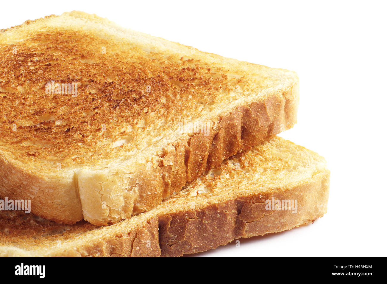 Two roasted toast bread on white background closeup Stock Photo - Alamy