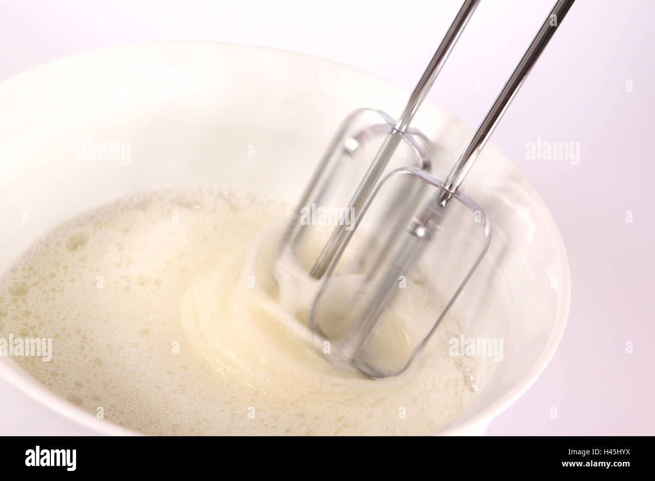 White egg, mixer, beaten egg white hit Stock Photo - Alamy