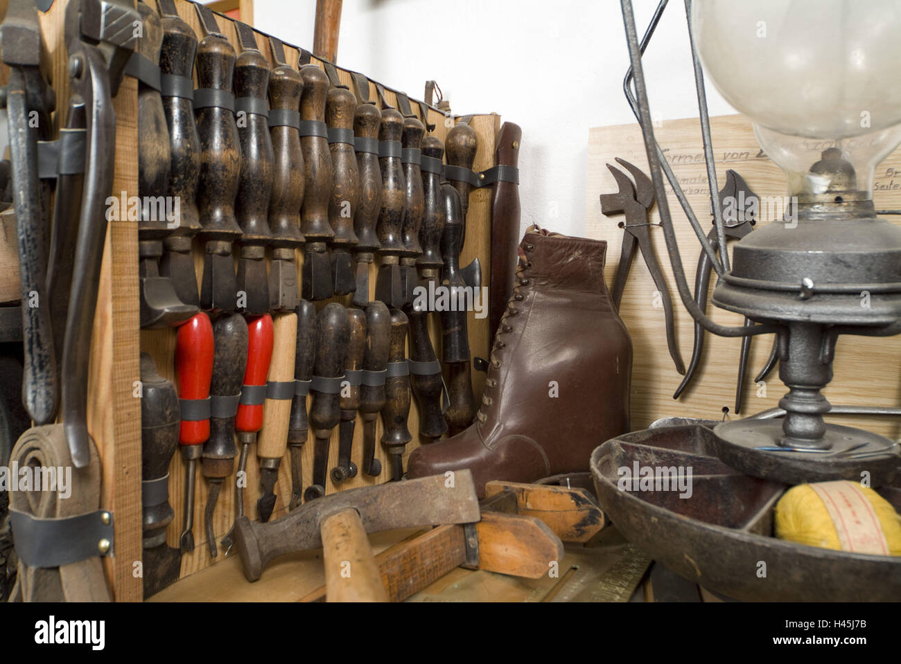Shoemaker's tools, historical Stock Photo - Alamy