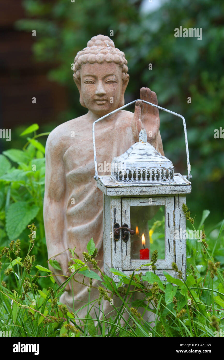 Garden figure with lantern Stock Photo - Alamy
