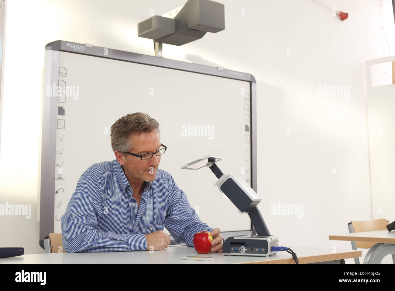 Teacher, classroom, Whiteboard, document camera, lessons Stock Photo ...