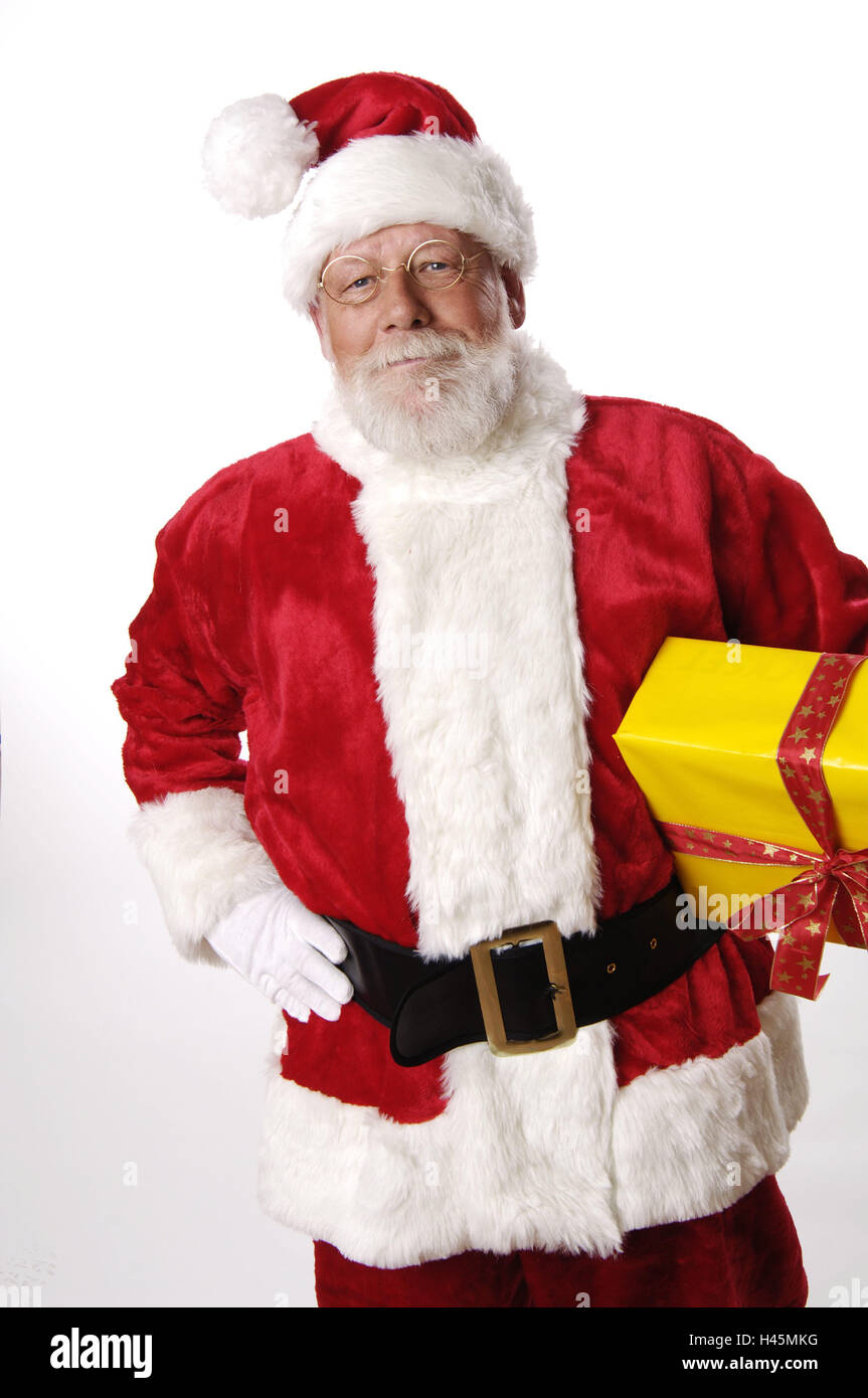 Santa Claus, smile, present, hold, half portrait, studio recording, man ...
