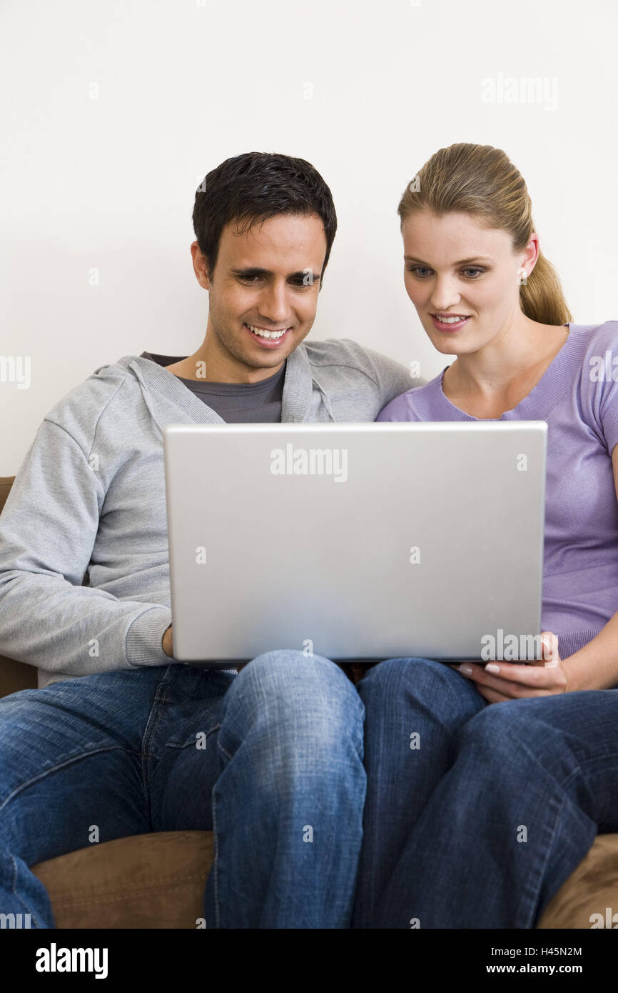 Couple, laptop, sofa, sit, homes, together, together, smile, work ...