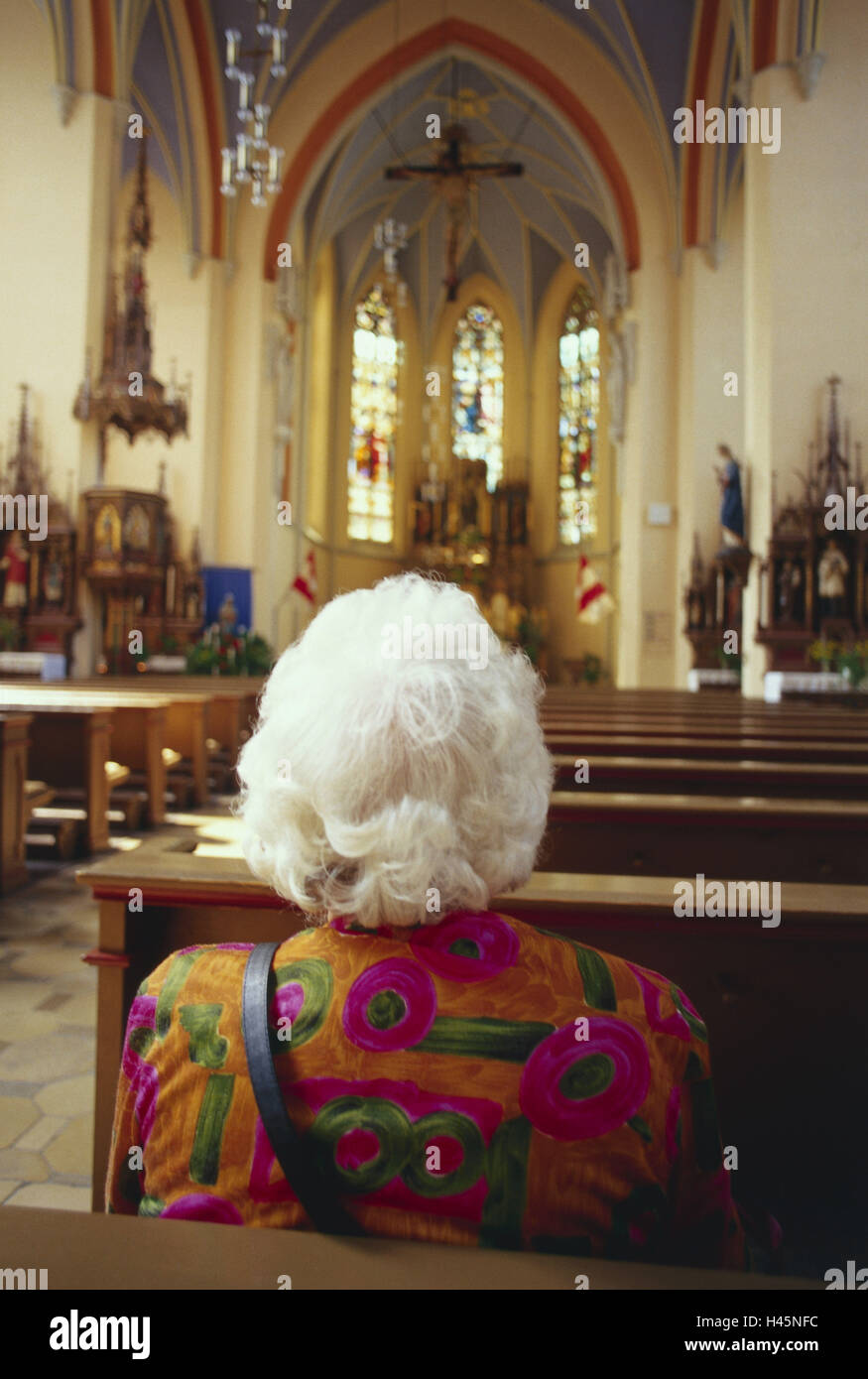 Woman church pew hi-res stock photography and images - Alamy
