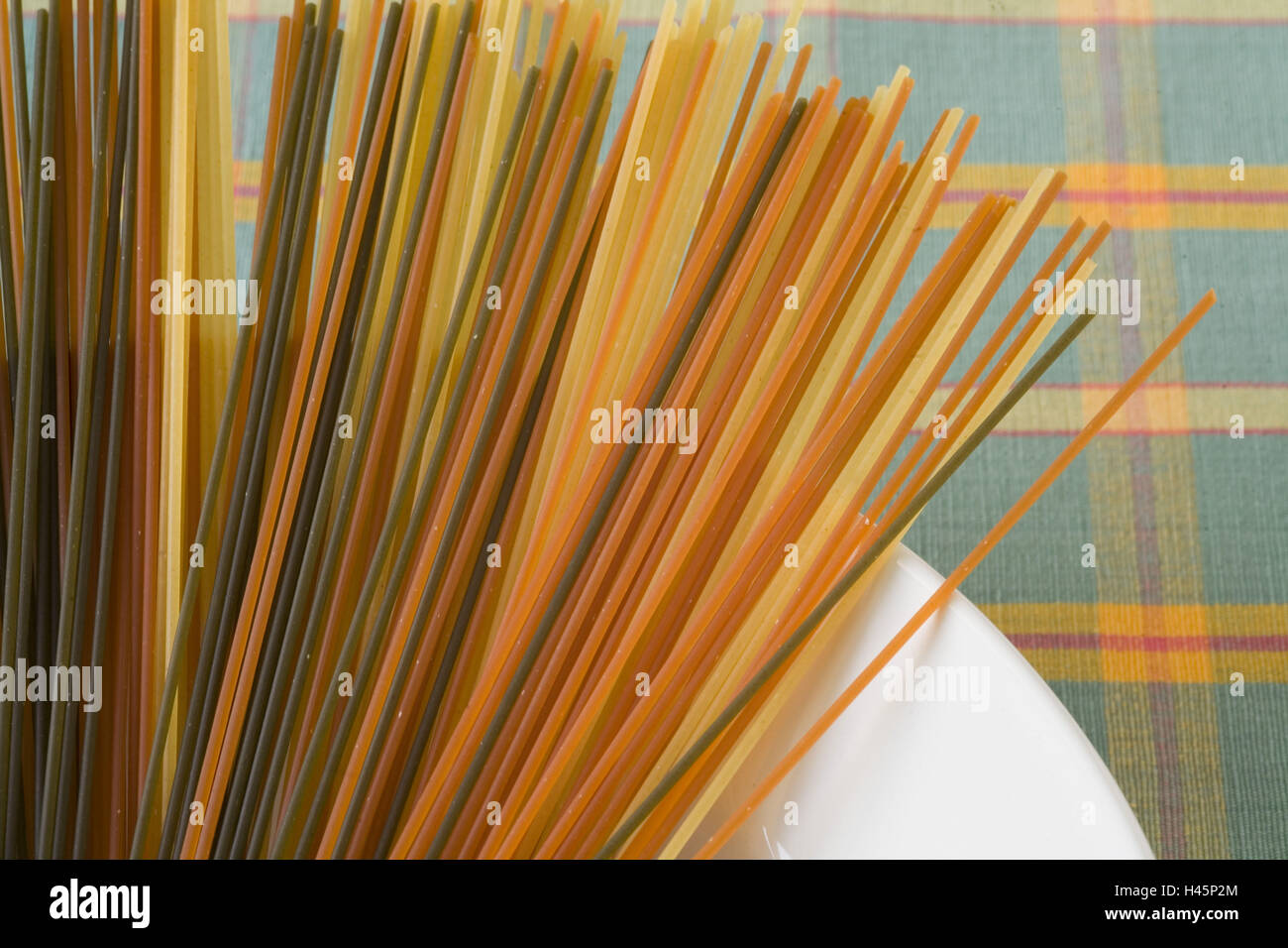 Spaghetti, colourful, raw Stock Photo - Alamy