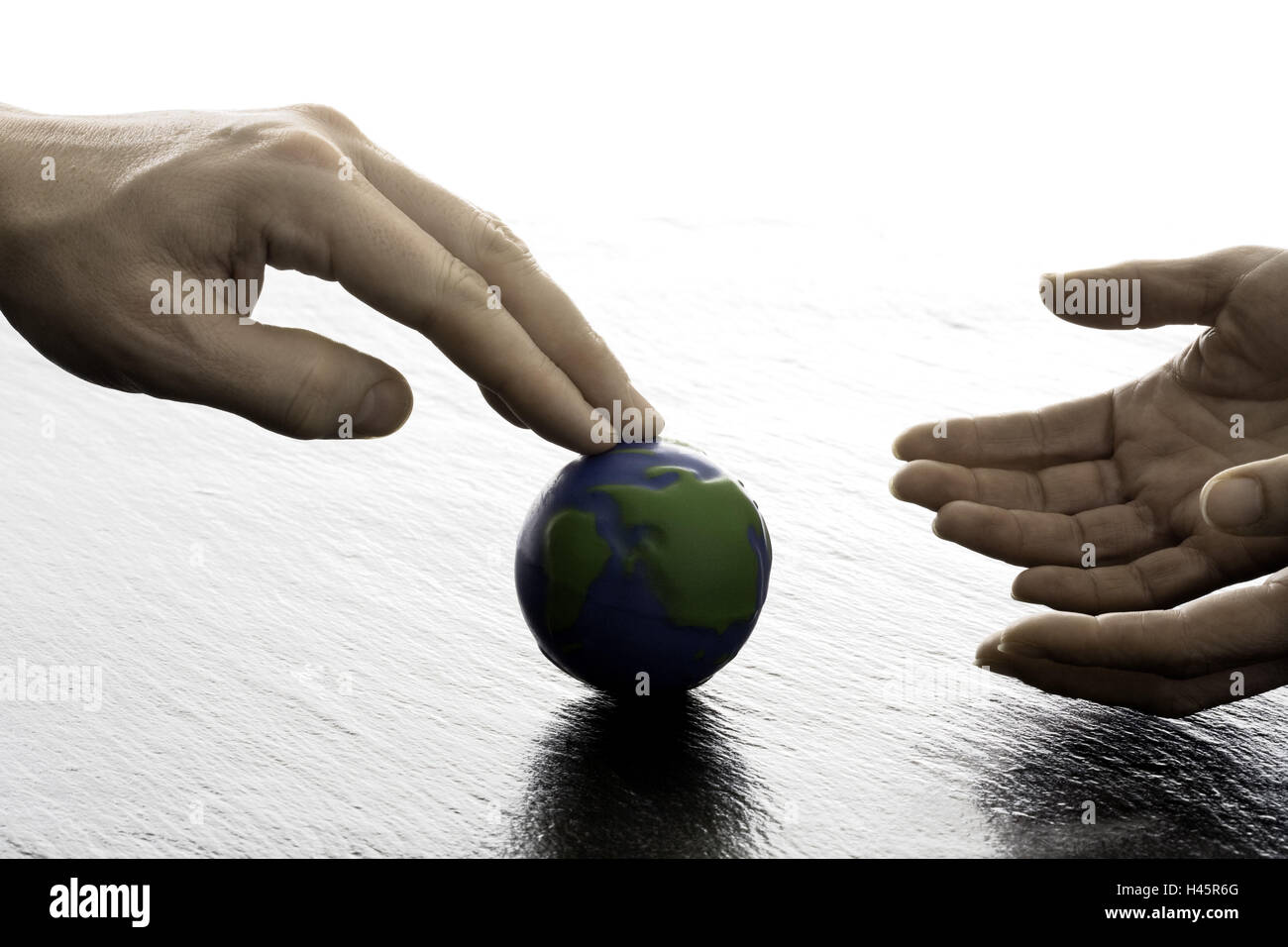 Hands, detail, finger, ball, globe Stock Photo - Alamy