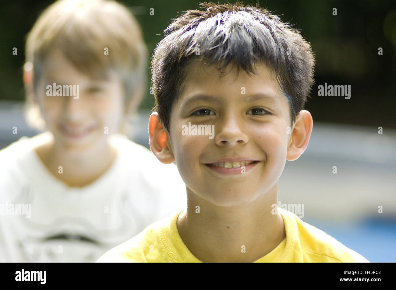 Boy, view camera, smile, portrait, background, friend, vague, people ...