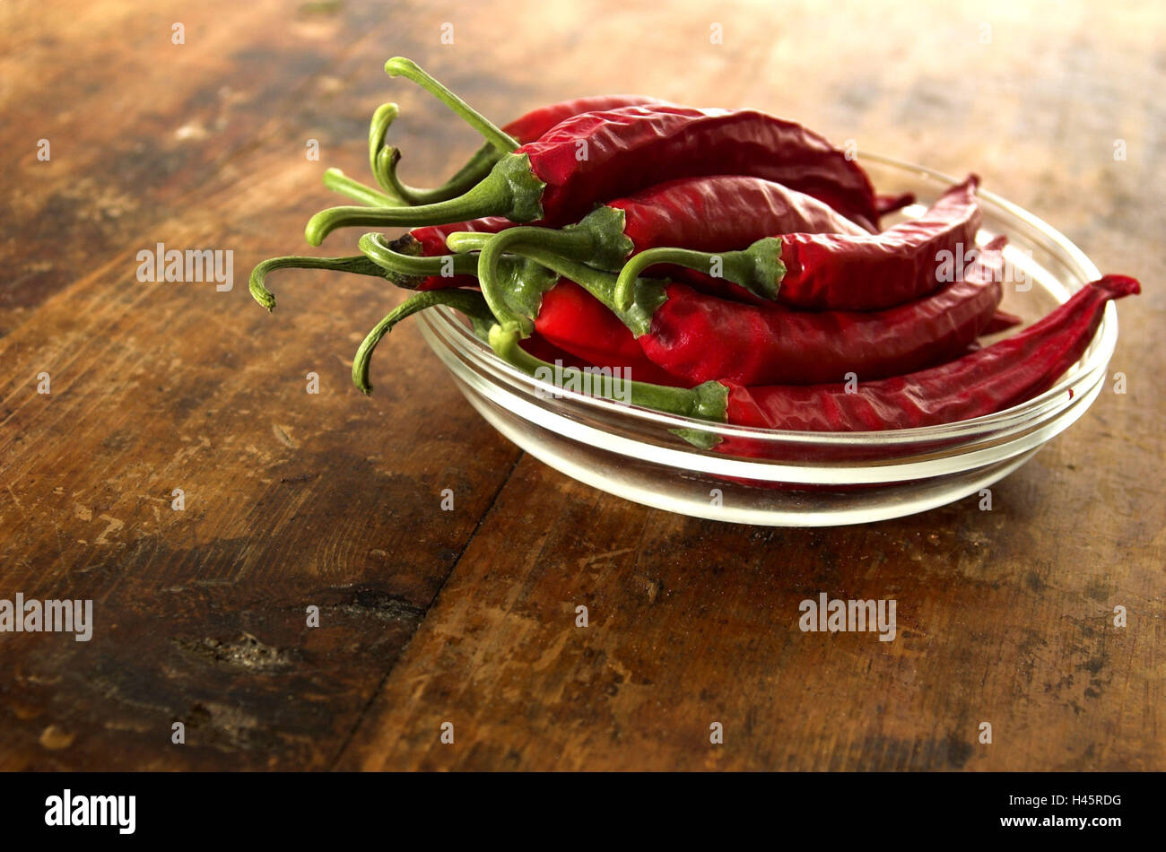 Glass peel, chilli pods Stock Photo - Alamy