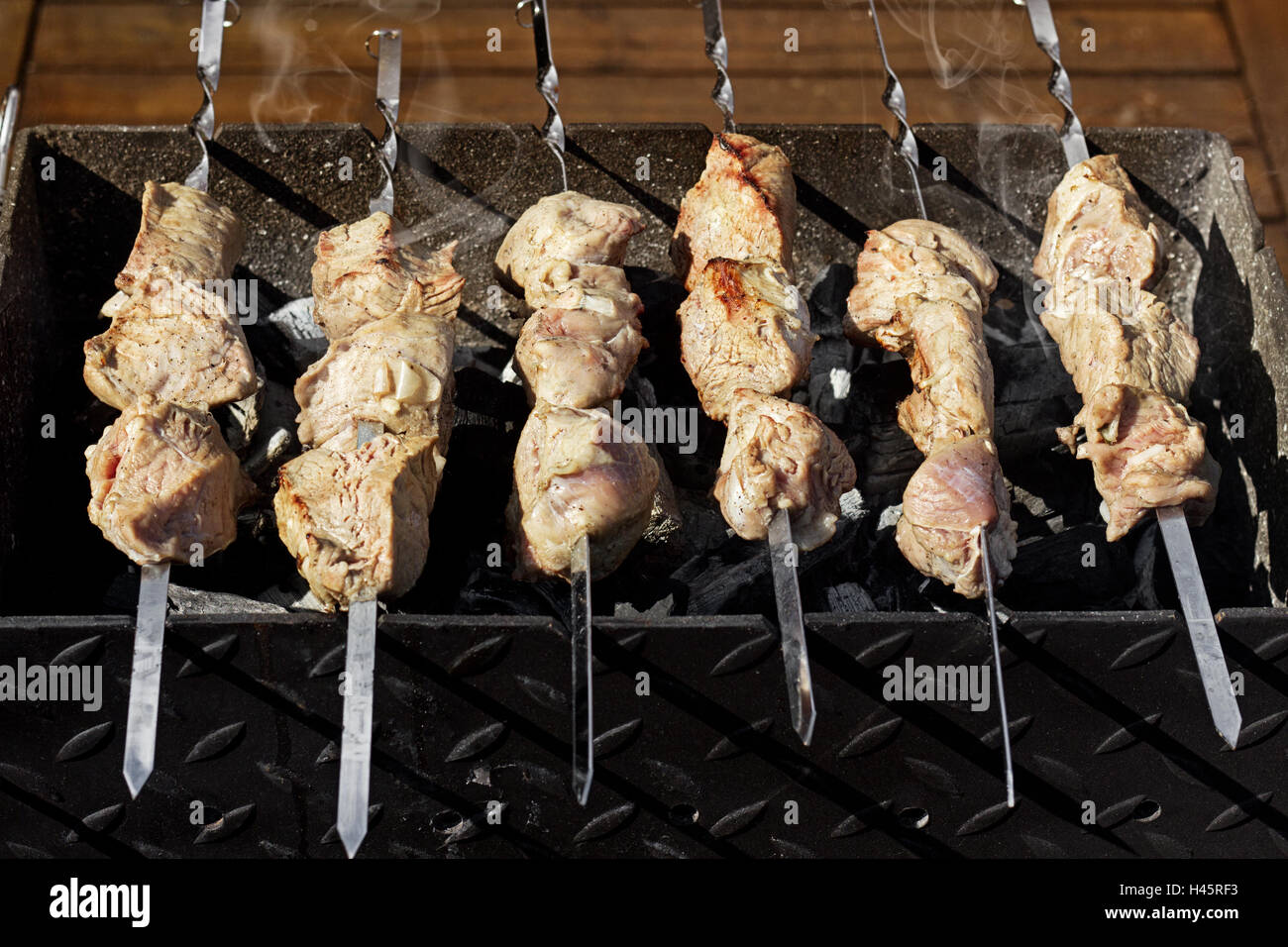 Grilled meat on terrace outdoors Stock Photo - Alamy