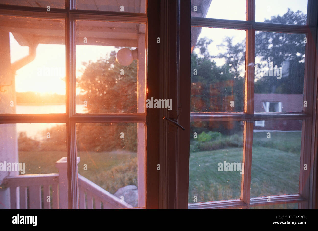 Residential house, window, sundown Stock Photo - Alamy