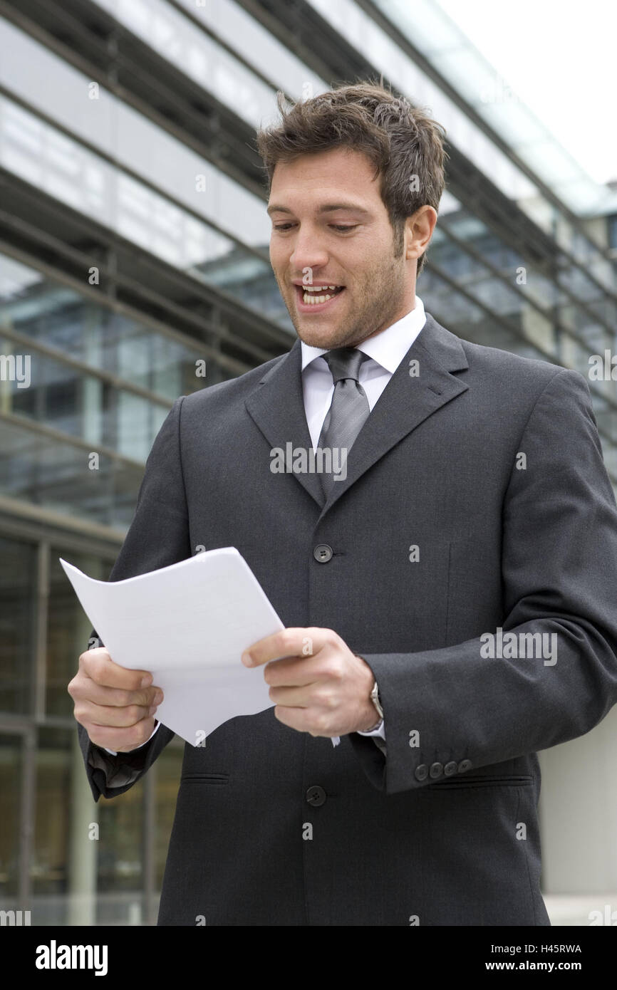 Office buildings, manager, document, read, cheerful, outside Stock ...