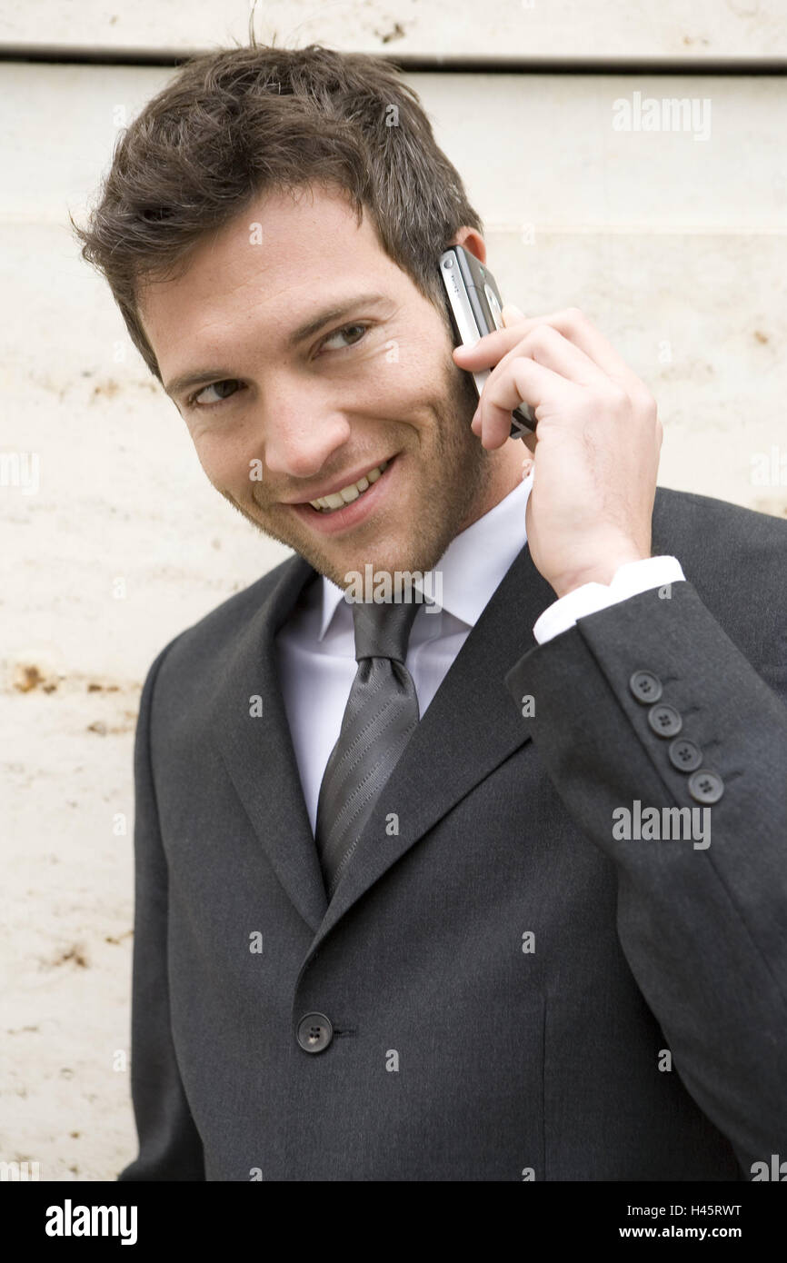 Office buildings, manager, mobile phone, telephone, smile, mirror image ...
