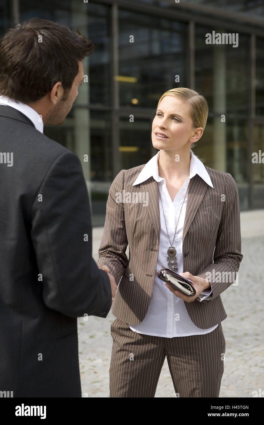 office buildings, business people, conversation, handshake Stock Photo ...