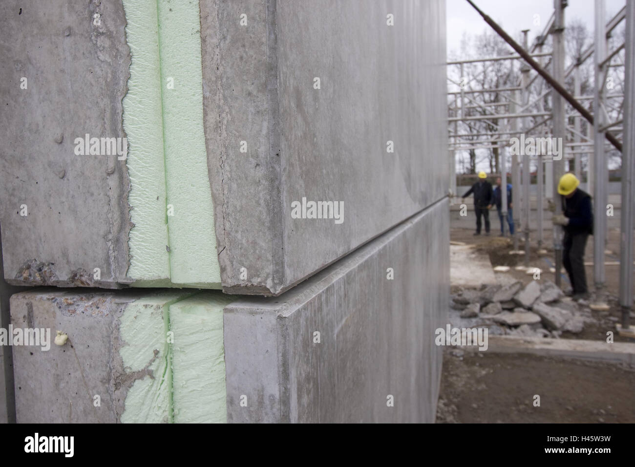 Men at work, concrete components, scaffolding, construction worker ...