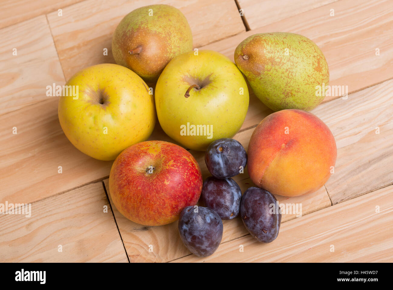fruits on wooden table, studio picture Stock Photo - Alamy
