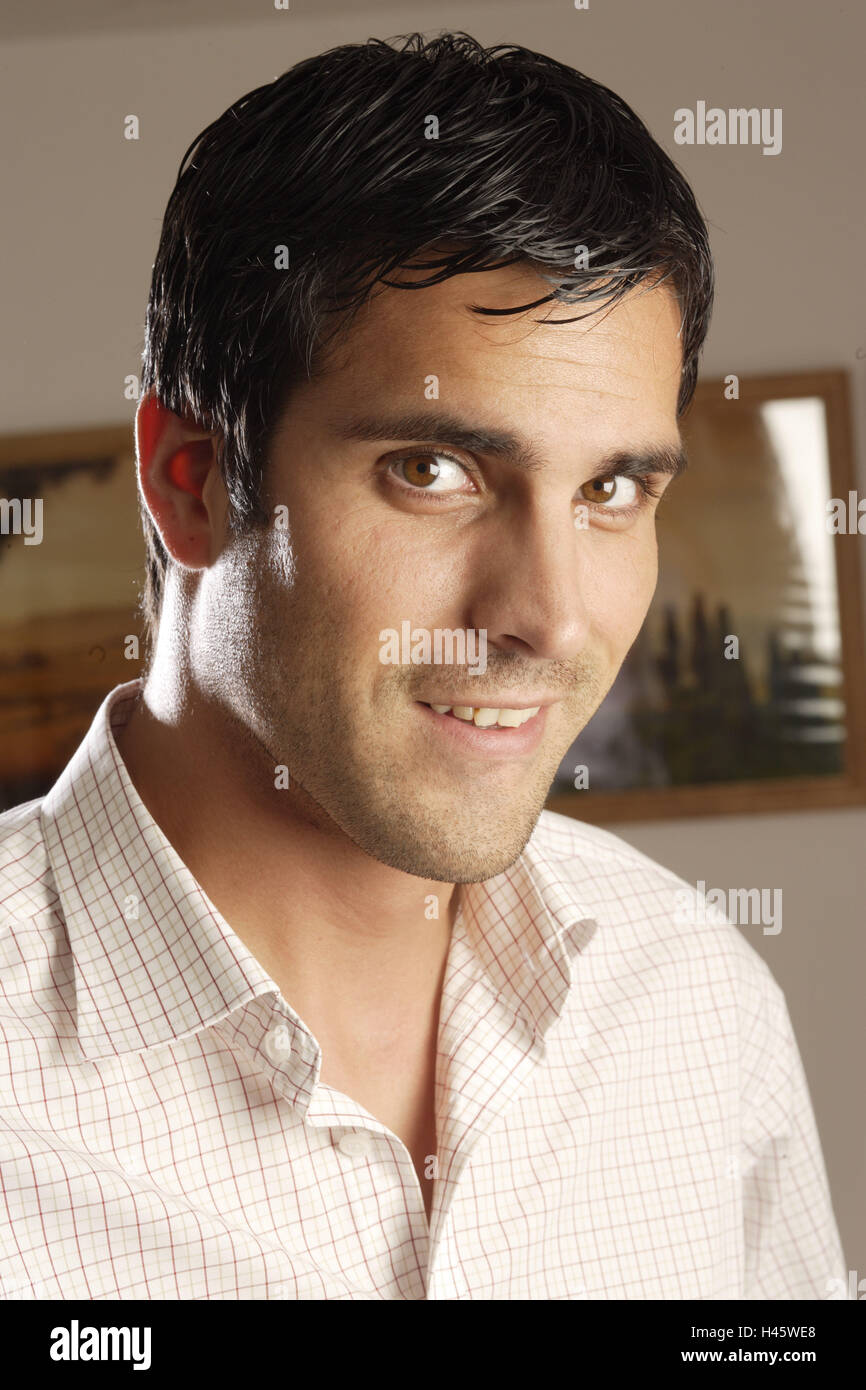 Man, young, smile, portrait, inside Stock Photo - Alamy