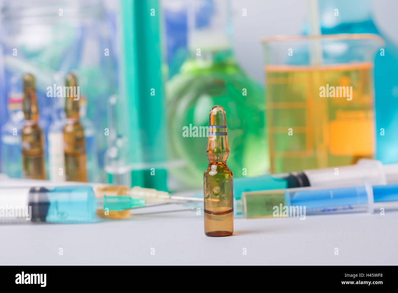 syringe with ampules of drugs Stock Photo - Alamy