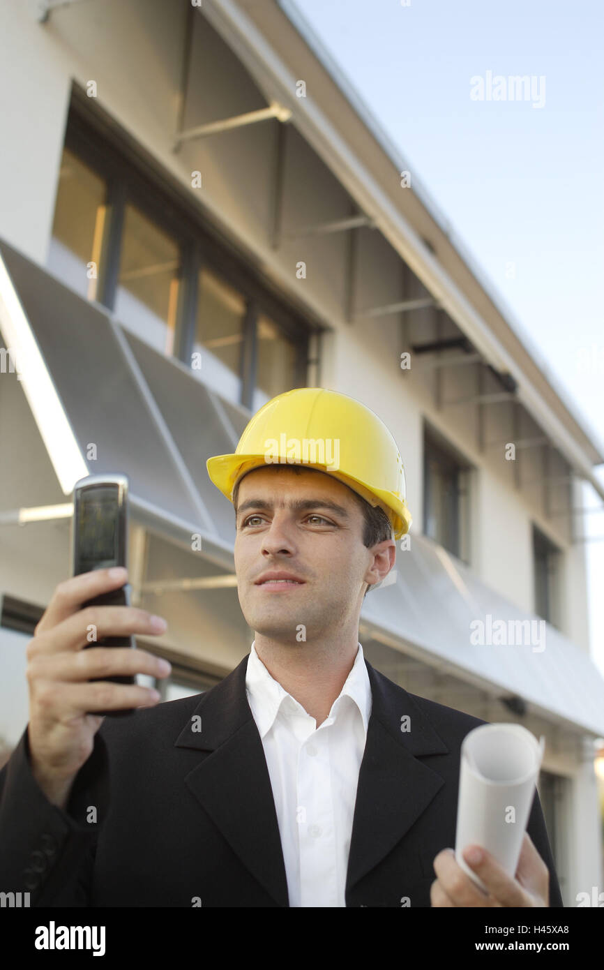 Architect, house, architect's plan, mobile phone, outside, portrait ...