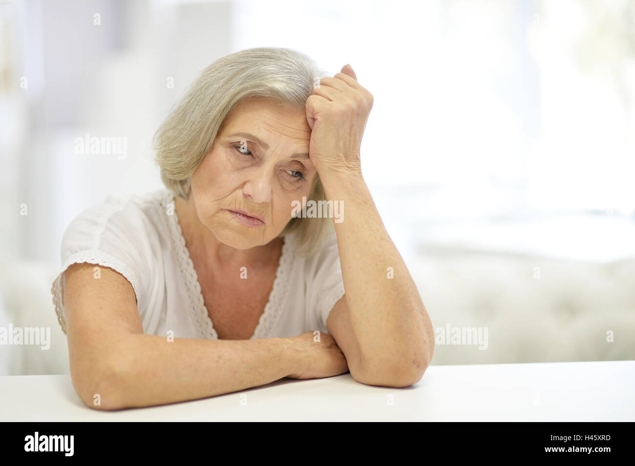 Thoughtful sad woman Stock Photo - Alamy