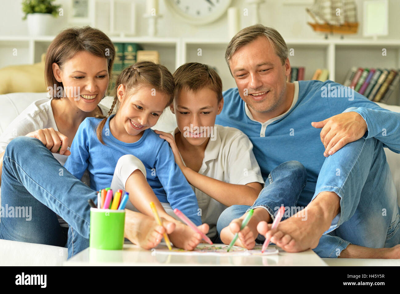 Portrait of happy family painting Stock Photo - Alamy